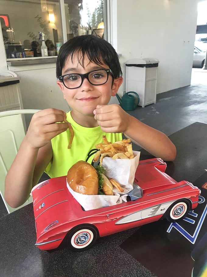 Pure joy captured – when the food is this good, thumbs up is the only appropriate response.