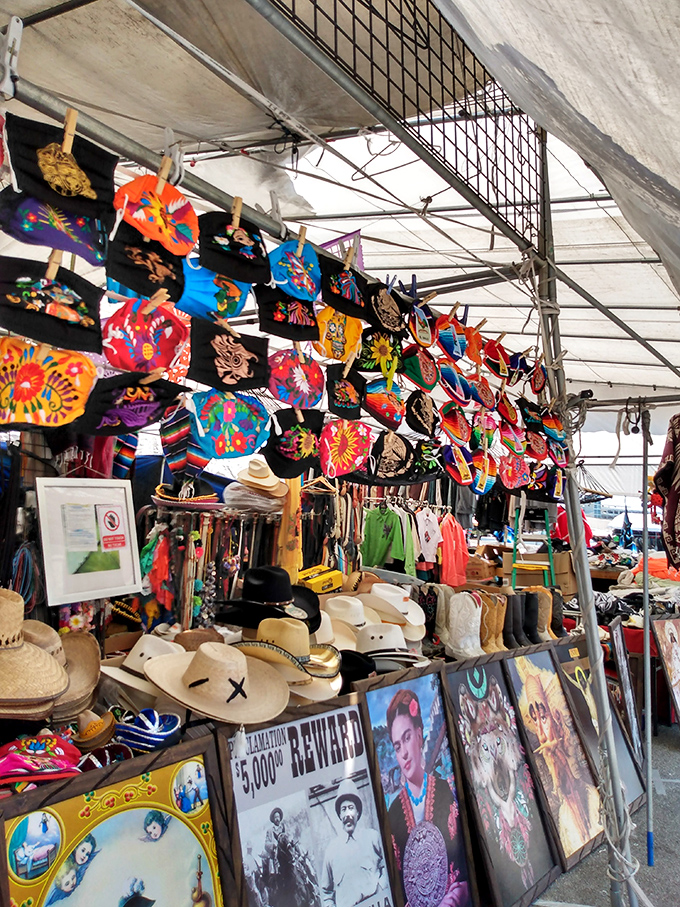 A hat lover's dream where cowboy classics meet vibrant masks – headwear that makes a statement louder than a mariachi band at midnight.