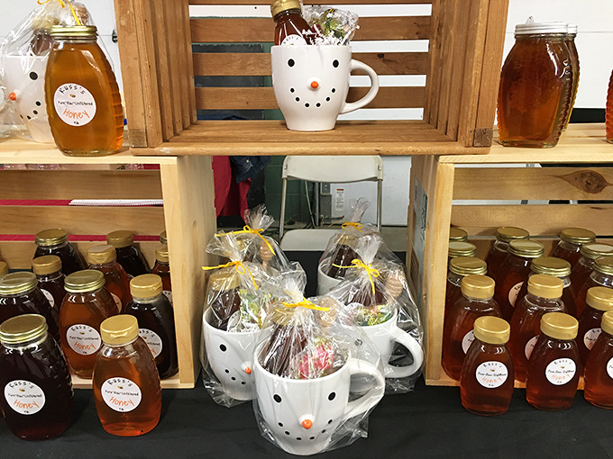 Liquid gold in mason jars! Local honey displayed in snowman mugs proves that sweetness and whimsy make perfect shopping companions.