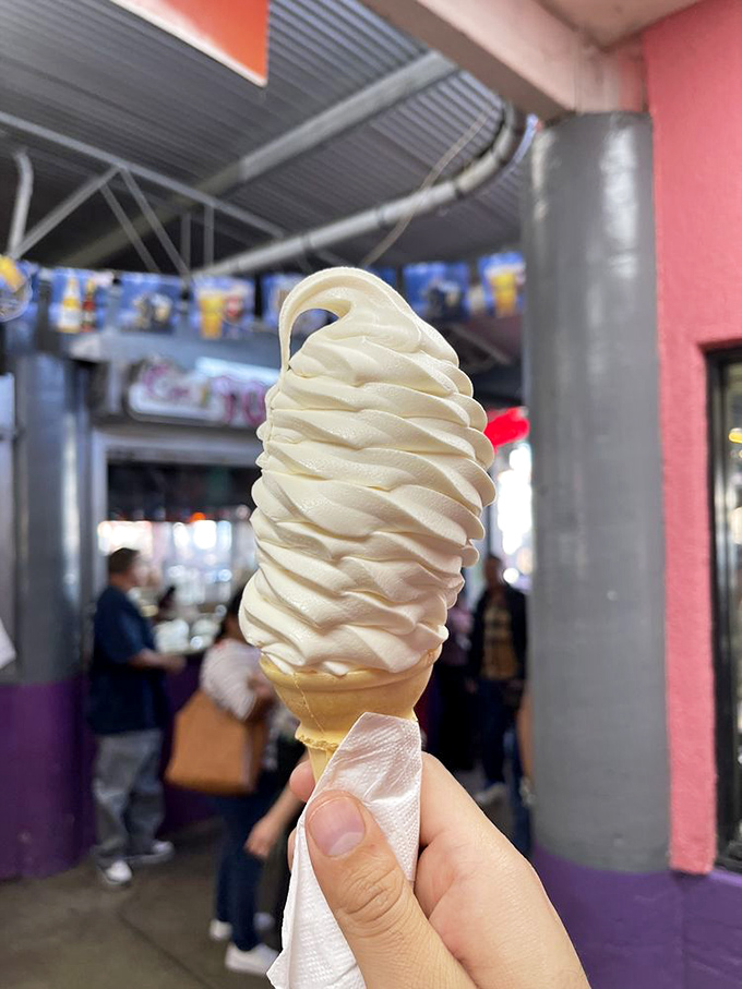 Soft-serve ice cream swirled to architectural perfection. The perfect cool finale after a spicy seafood symphony.