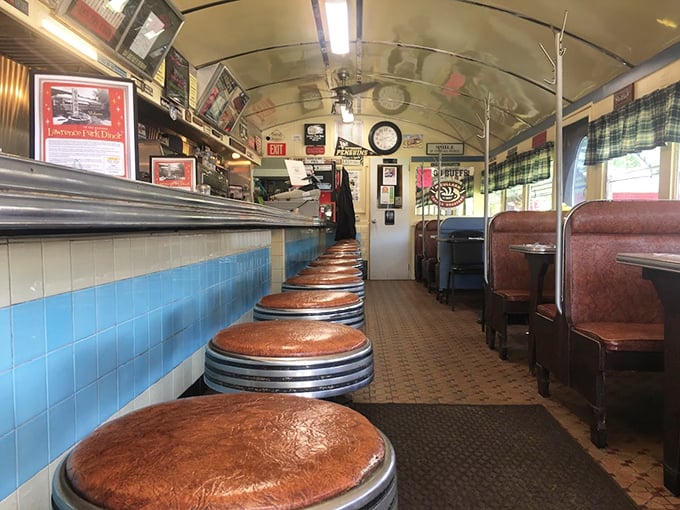 The quintessential diner view&mdash;a row of empty stools just waiting for the next shift of regulars to claim their spots.
