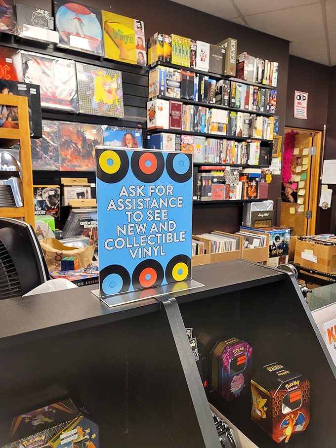 "Ask for assistance to see collectible vinyl"&mdash;because some treasures, like the best stories, require a guide to fully appreciate.