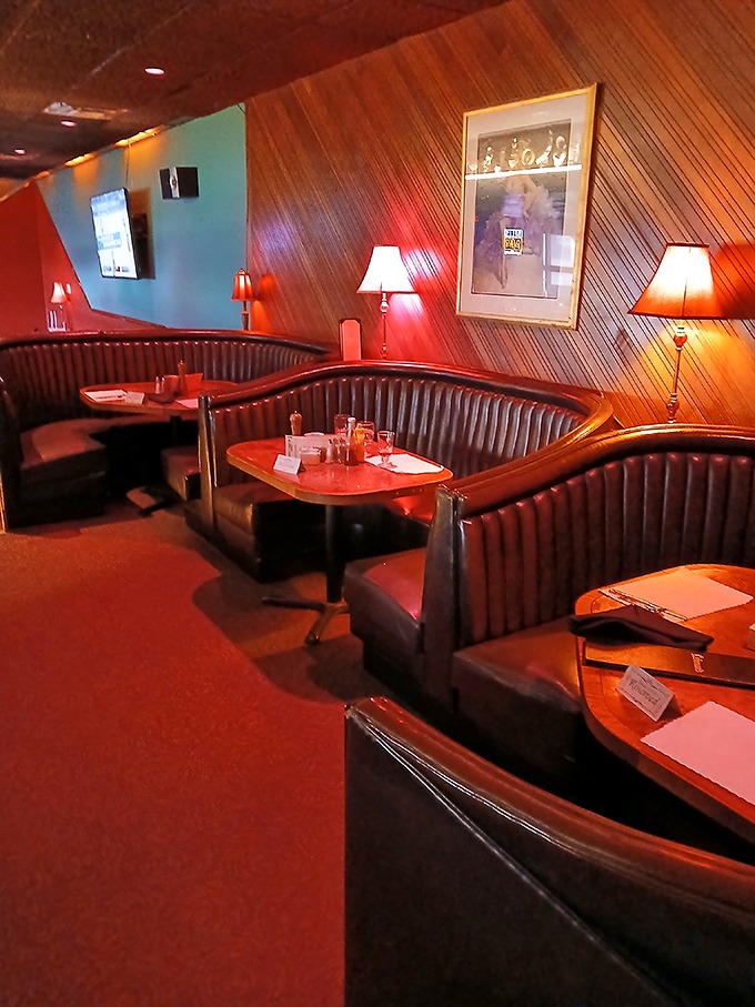 Those curved booths aren't just seating&mdash;they're intimate conversation pods designed for lingering long after dessert is finished.