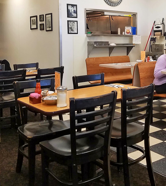 Simple wooden tables and chairs that have witnessed first dates, family reunions, and countless "I shouldn't have that third pancake" debates.