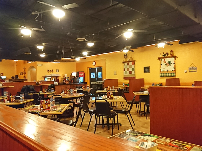 The warm yellow walls create an atmosphere that feels like a hug. This is where breakfast isn't rushed—it's revered, as it should be.