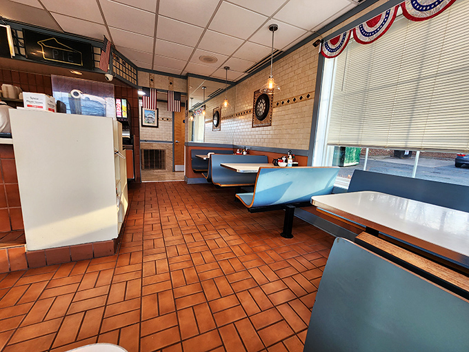 Blue booths that have cradled generations of Alexandria residents through first dates, family celebrations, and morning-after recovery missions.