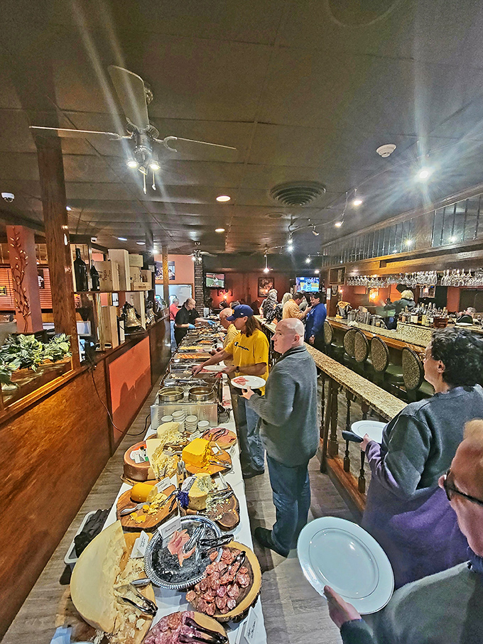 The bustling buffet line proves that Station Square knows how to throw a spread. Those platters aren't just food&mdash;they're edible community builders.