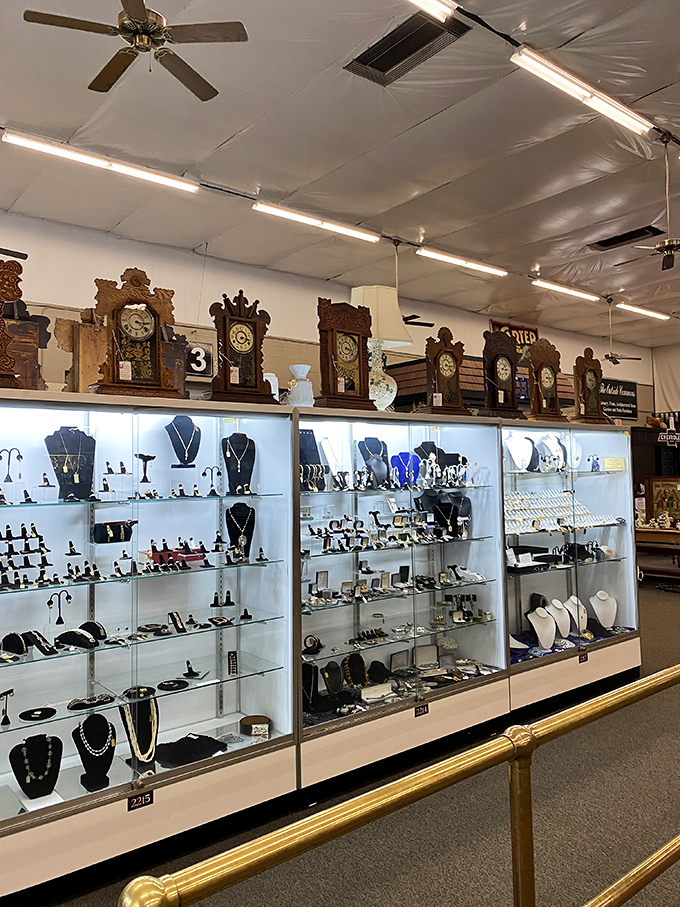 Jewelry cases that sparkle with history. Vintage timepieces above and glittering accessories below create a treasure chest of wearable nostalgia.