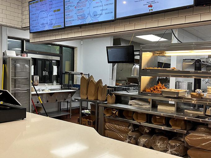 The command center of crispiness&mdash;where raw ingredients transform into southern-fried perfection. Those heat lamps are keeping your happiness warm.