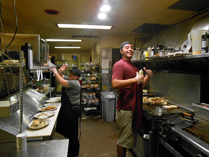 Where breakfast magic happens—skilled hands transforming simple ingredients into morning masterpieces that keep customers coming back for decades.