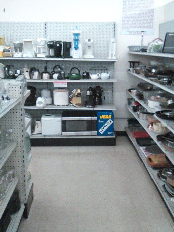 Kitchen appliance alley: where coffee makers, toasters, and teapots await their next countertop. That waffle iron has weekend brunches in its future. 