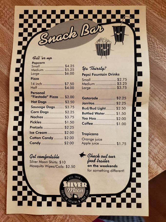 That checkered menu border screams "American classic" while offering everything from popcorn to the mysteriously named "Yoo Hoo" drink.