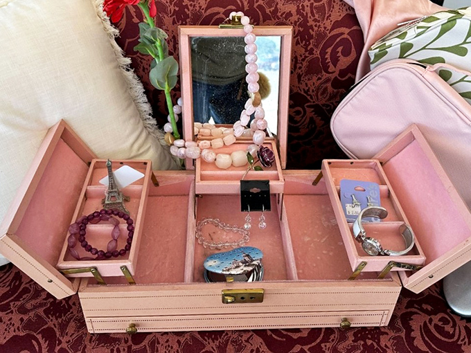A jewelry box that's seen more treasure than some pirates. Those compartments are just waiting to organize your accessories collection. 