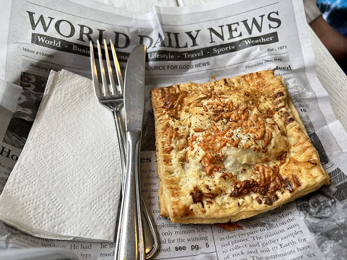 This savory hand pie doesn't need utensils&mdash;just an appetite and the willingness to temporarily abandon your diet plans.