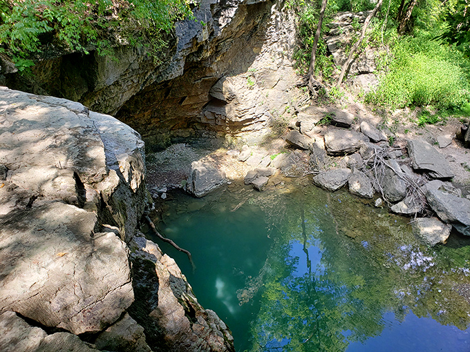 The crystal-clear pool beneath the falls invites contemplation. Those turquoise waters could convince you you're in the Caribbean, until Ohio weather reminds you otherwise.