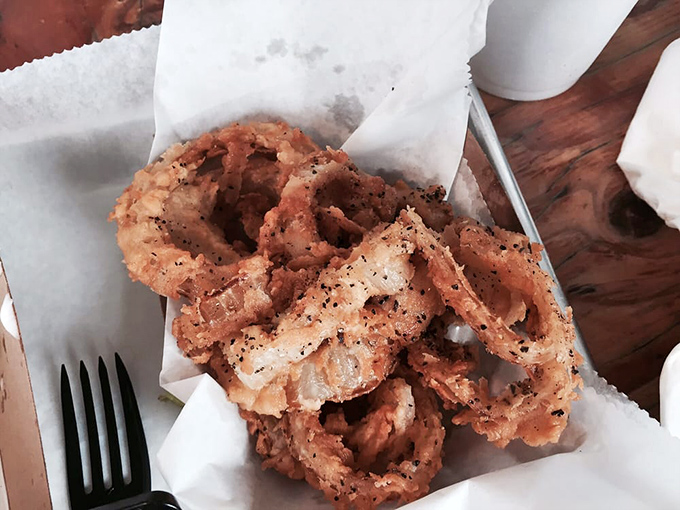 These aren't your average onion rings – they're crispy, golden halos of happiness that deserve their own fan club.