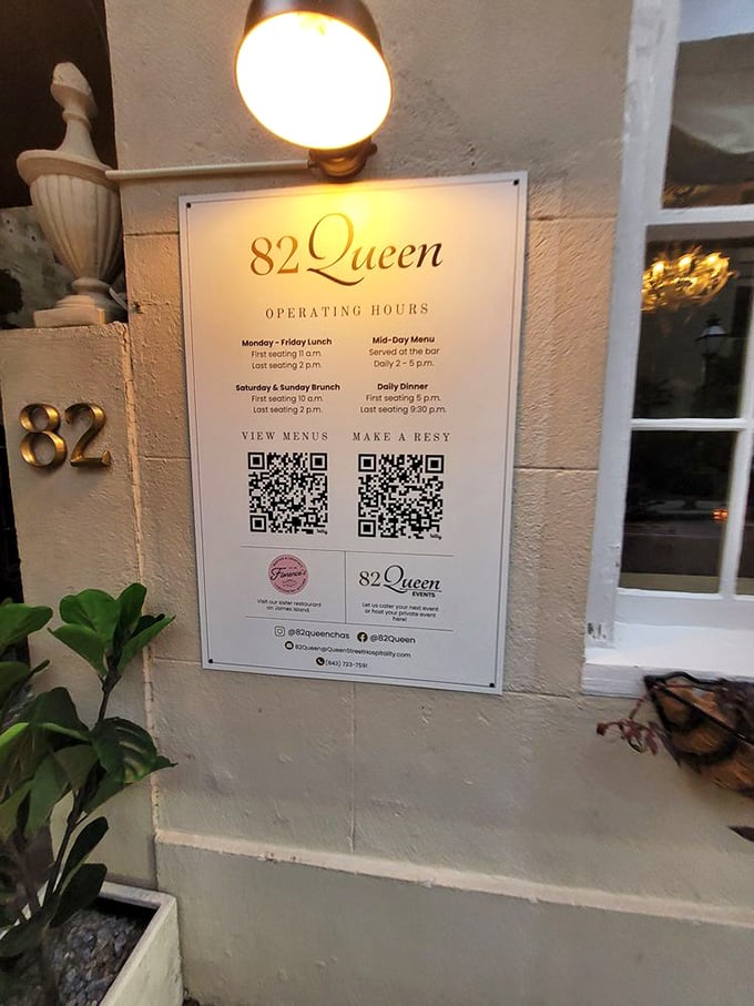 Even the hours of operation sign looks elegant at 82 Queen. QR codes bring modern convenience to this historic culinary landmark. 