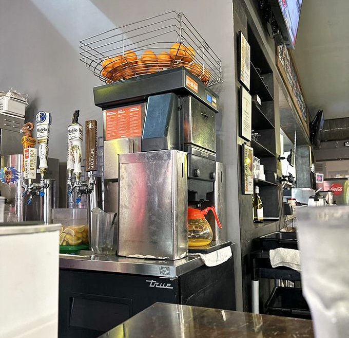 Fresh-squeezed orange juice machine standing at attention. Because proper breakfast deserves proper juice&mdash;no cartons allowed in this temple of morning meals.