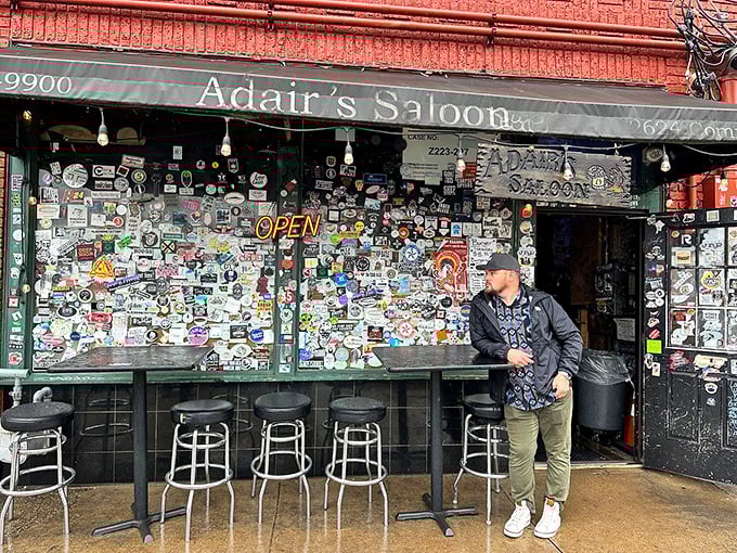 The entrance that's seen it all. Each sticker tells a story of bands, travelers, and regulars who've found their way to burger paradise.