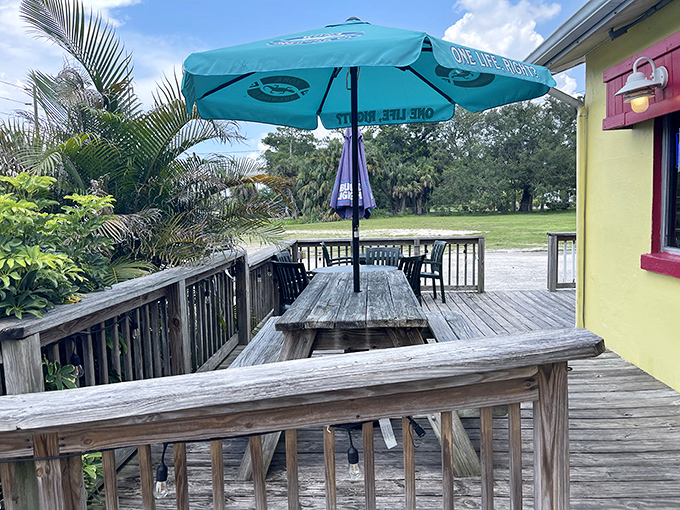 The wooden deck offers al fresco dining under Florida skies. Because breakfast tastes better with a side of sunshine and palm trees.
