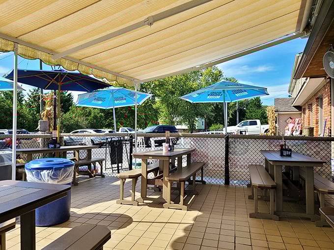 Outdoor seating that combines the best of both worlds&mdash;fresh air and fresh seafood under cheerful blue umbrellas.