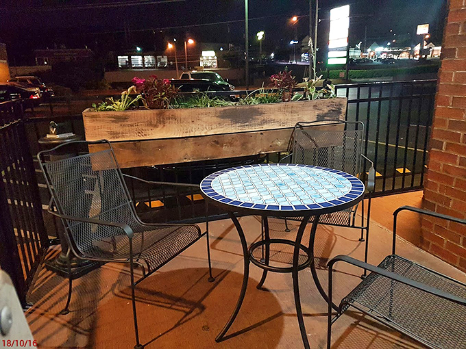 The outdoor recovery area where overheated diners catch their breath between bites. Sometimes you need a moment to question your life choices.