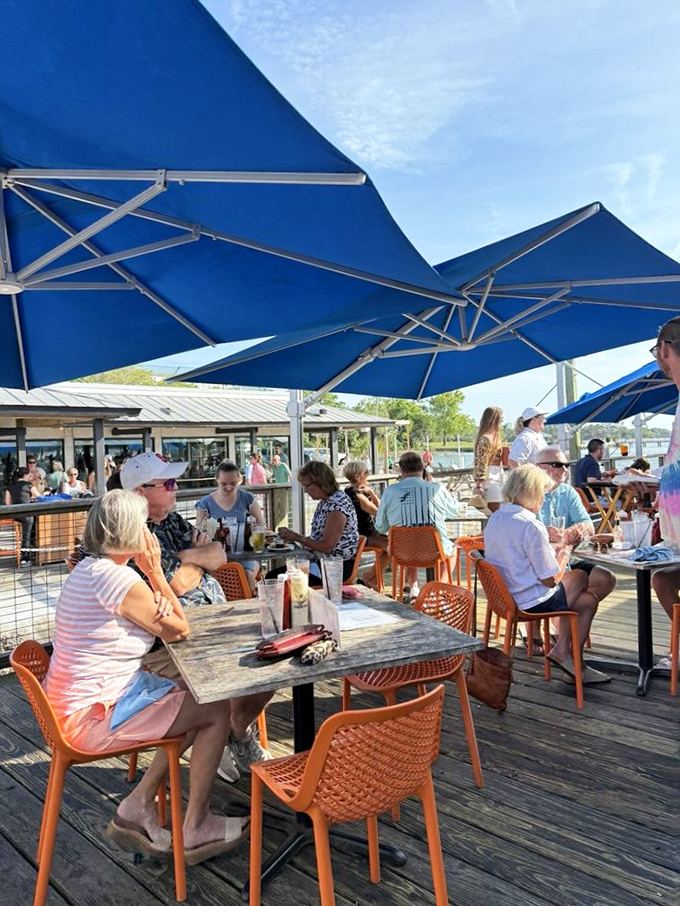The outdoor deck: where "I'll just have a quick lunch" turns into "I guess we're watching the sunset here too."