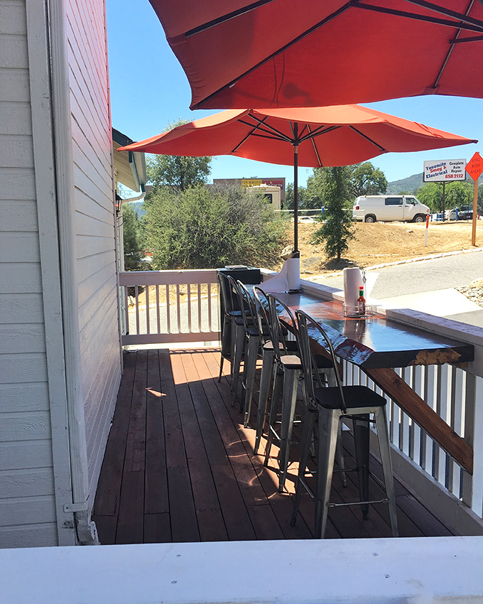 Outdoor seating with mountain views and fresh air&mdash;nature's perfect palate cleanser between bites of heavenly BBQ.