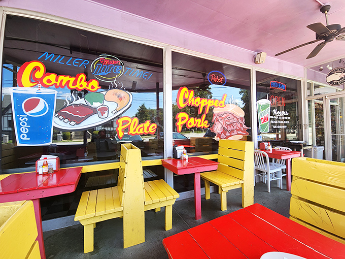 Outdoor picnic tables painted as bright as the flavors inside. Yellow benches practically shout "sit down and stay awhile!"