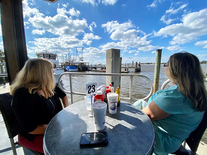 Waterfront dining that reminds you why people pay ridiculous prices to live in Florida. Your sweet tea tastes better with a side of boat-watching.