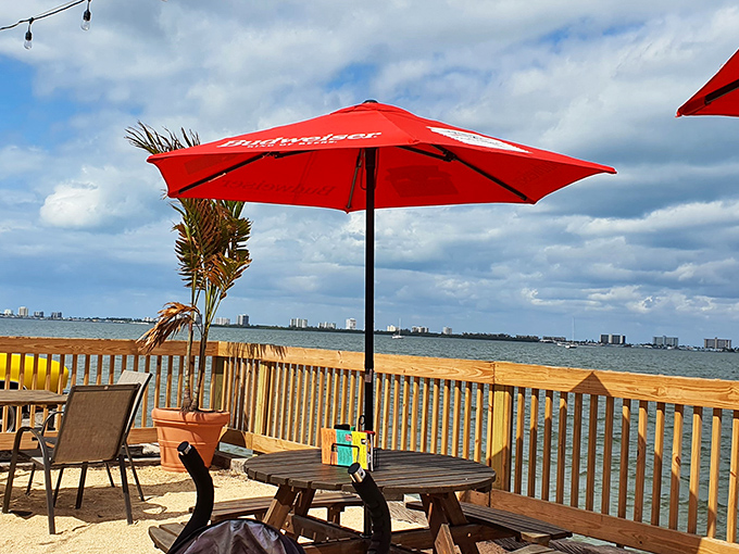 That waterfront view isn't just pretty&mdash;it's the supporting character in your meal's story, complete with dramatic cloud formations.