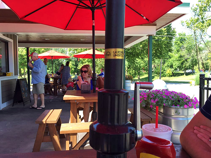 Summer perfection: cold drinks, warm sunshine, and the promise of something delicious arriving at your table any minute.