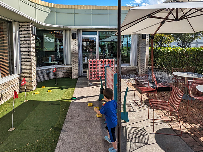 Who knew a mini-golf setup could make waiting for a table feel like a bonus activity rather than a chore? That's hospitality genius at work. 