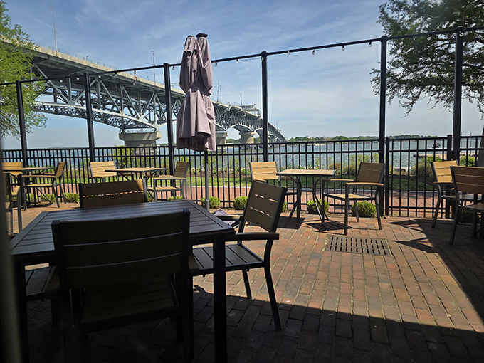 The outdoor patio offers front-row seats to nature's best show: the York River flowing beneath the bridge, with fresh air as the complimentary appetizer.