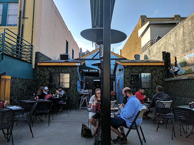 The outdoor seating area feels like dining in a secret garden, if that garden were decorated by surfers with excellent taste. California sunshine included at no extra charge.