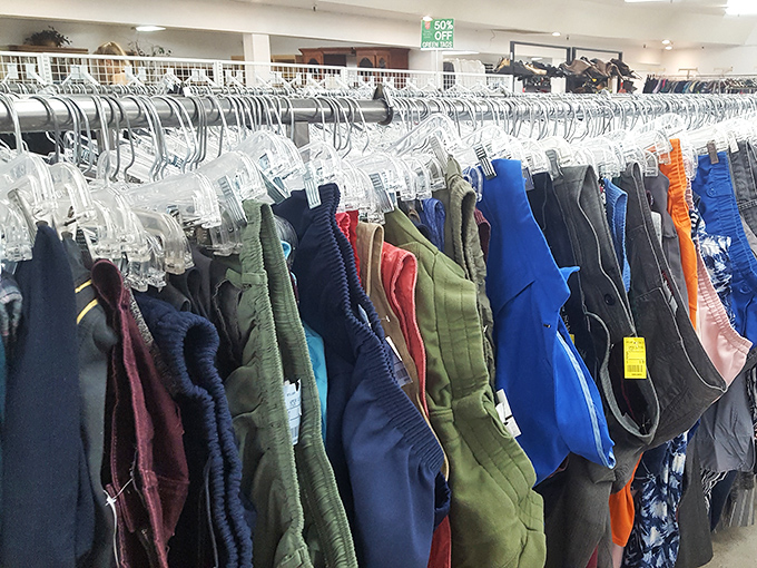 The pants section offers a rainbow of possibilities. These color-coded racks make finding your size and preferred hue an organized treasure hunt rather than a chaotic dig.