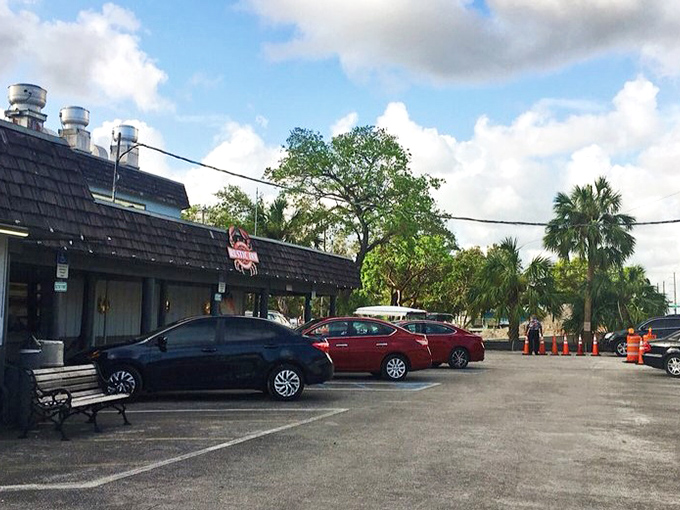 The parking lot might not look fancy, but those cars contain people about to have one of the best meals of their Florida vacation.