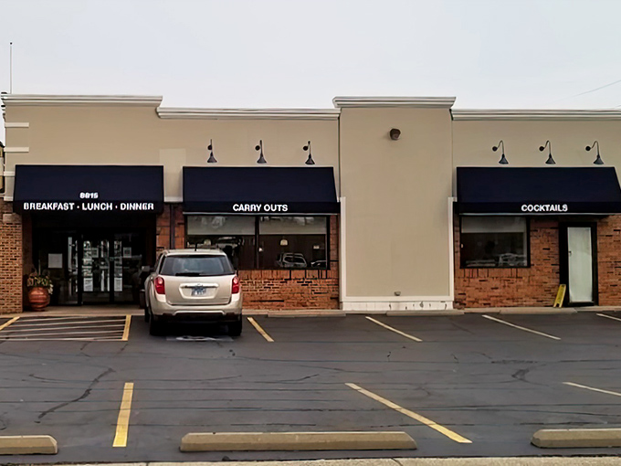 The parking lot: where anticipation builds and post-meal food comas begin. Worth every step from car to table.