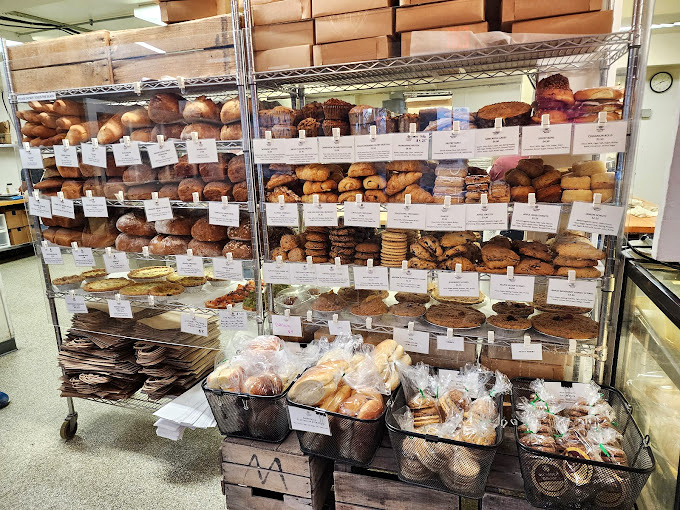 Shelves lined with temptation, where every pastry seems to be auditioning for your breakfast table.