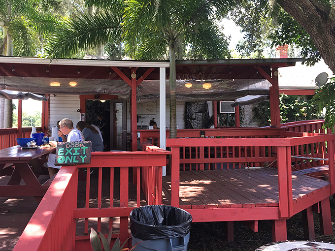 The red deck: where the gentle Florida breeze cools your brow as you contemplate ordering seconds. Spoiler alert: you will.