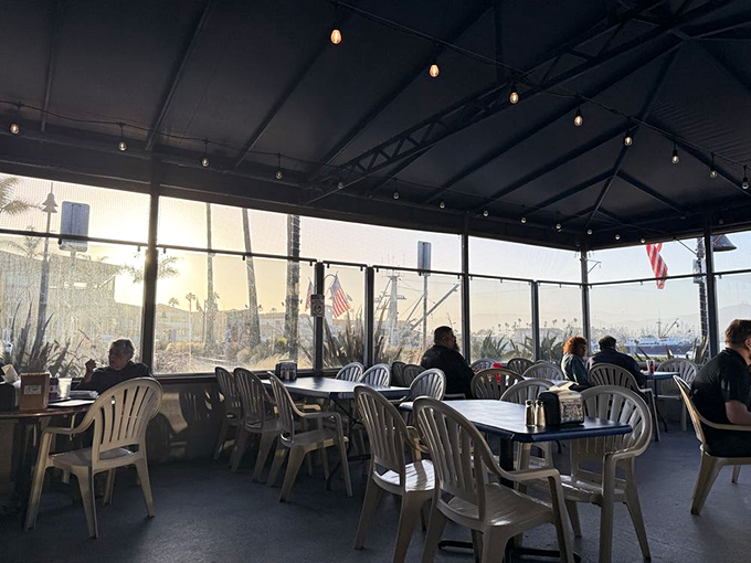 Patio dining with harbor views &ndash; where sea breezes enhance every bite you take.
