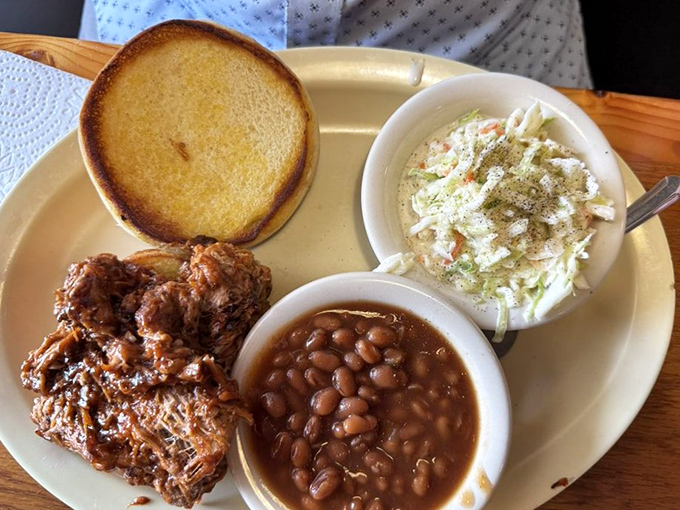 A plate that speaks Southern fluently &ndash; pulled pork, baked beans, and coleslaw forming the holy trinity of comfort food.