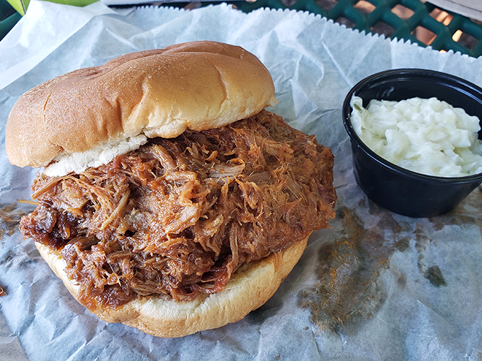 Bobby's BBQ sandwich doesn't mess around&mdash;tender pulled pork piled high on a soft bun with a side of creamy coleslaw. Napkins required, not optional.