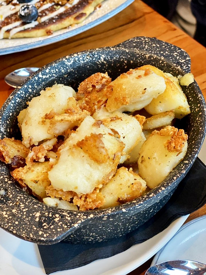 These aren't just potatoes; they're little golden nuggets of comfort that somehow taste like childhood and sophistication simultaneously.