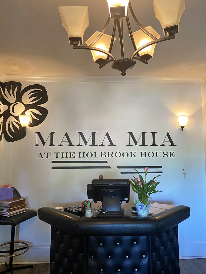 The welcoming reception area sets expectations high with its "Mama Mia at the Holbrook House" promise of authenticity.