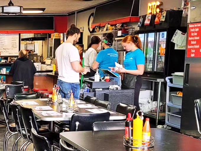 The heart of operations &ndash; where orders are taken, memories are made, and the staff moves with the efficiency of people who truly love what they do.