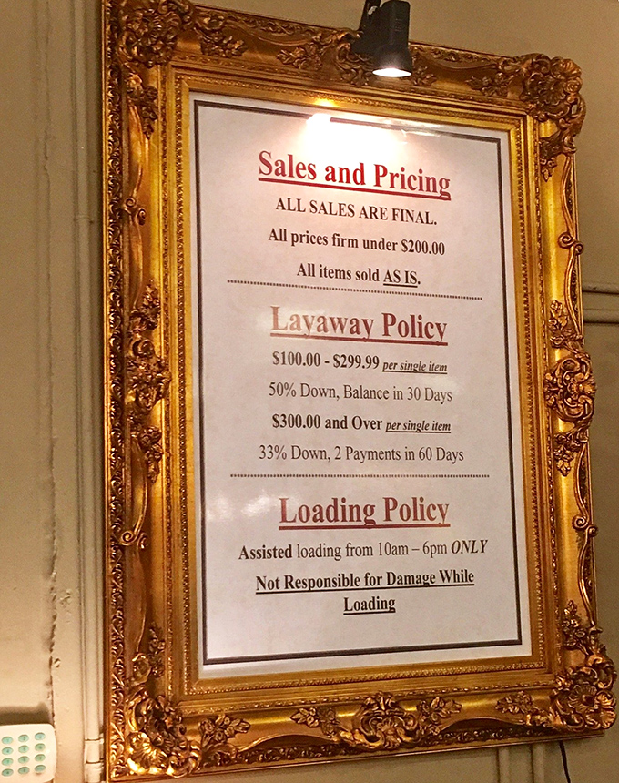 The policies are displayed with vintage flair &ndash; where else would payment terms come framed in something worthy of Versailles?