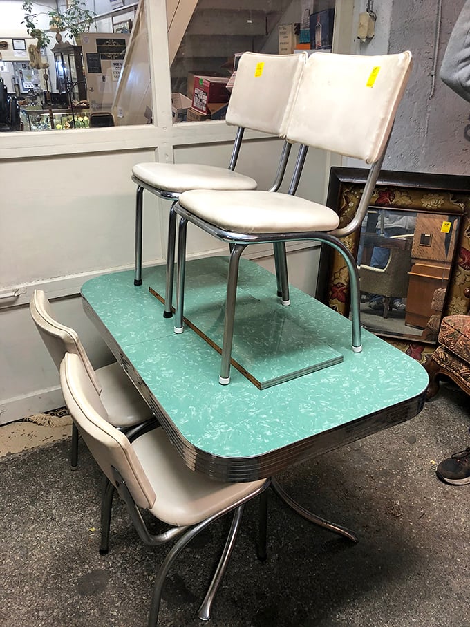 That mint-green Formica table with matching chairs isn't just furniture &ndash; it's a 1950s kitchen conversation waiting to happen again.