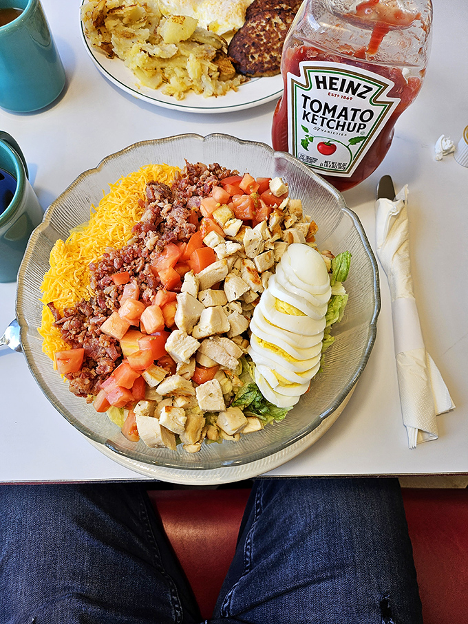 A Cobb salad arranged with military precision&mdash;each ingredient standing at attention, waiting for the honor of being devoured first.