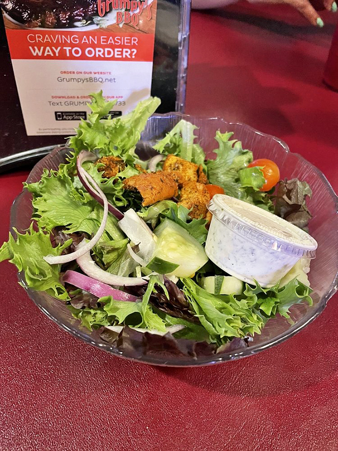 Even the salad gets the Grumpy's treatment&mdash;fresh, colorful, and substantial enough to hold its own on a table dominated by meat.